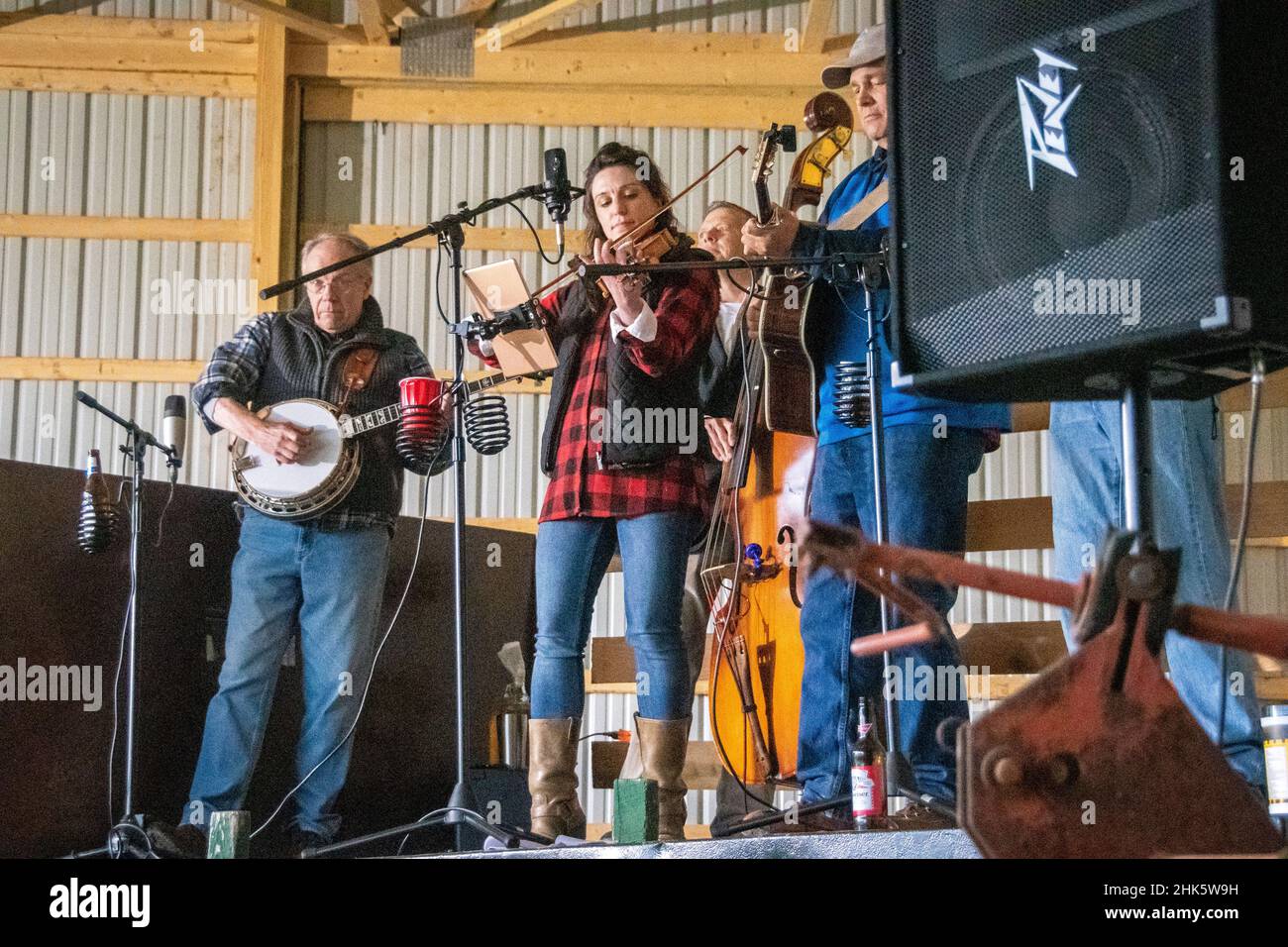 The Mayo Family band performing a barn concert from the back of a ...