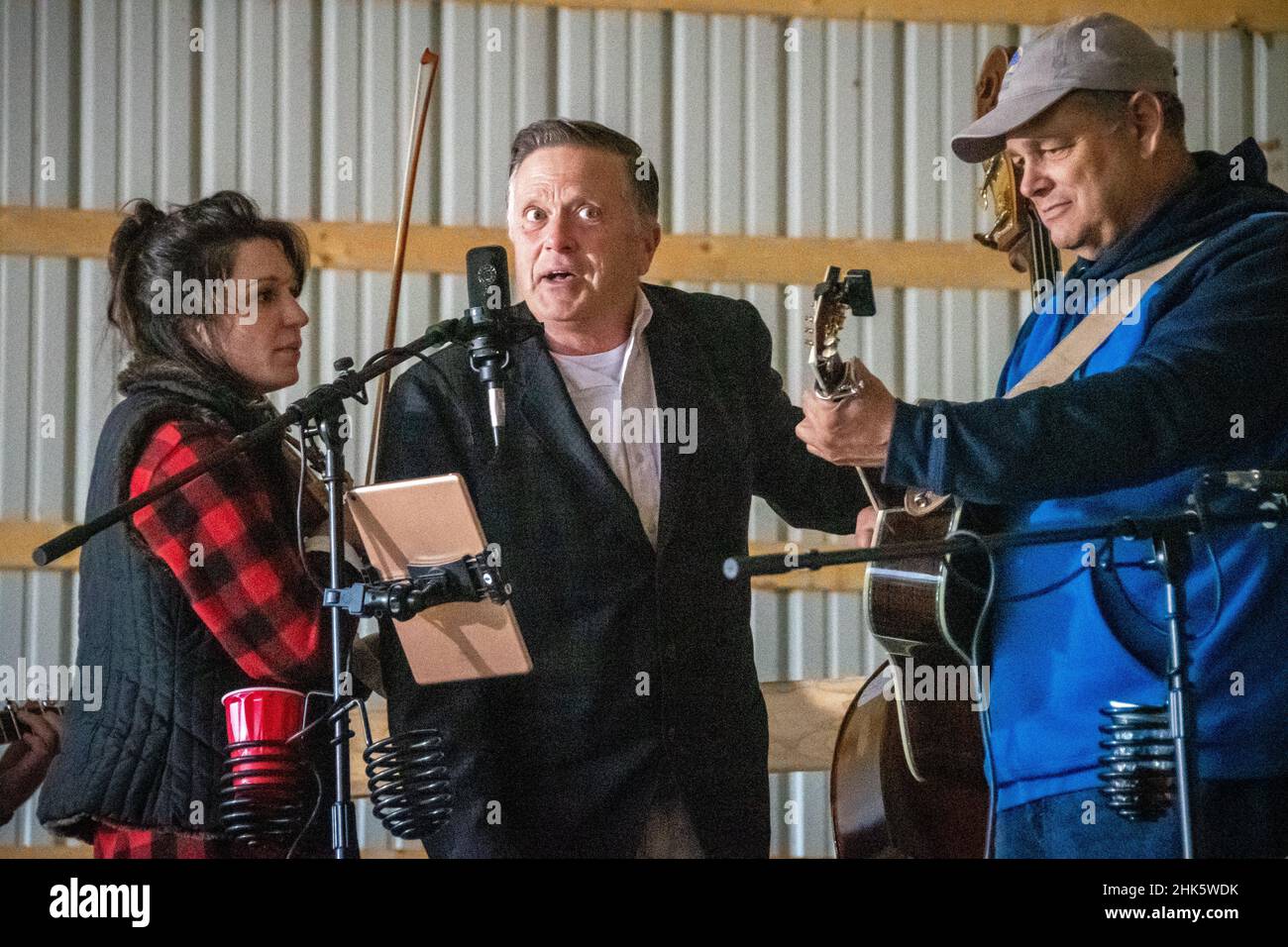 The Mayo Family band performing a barn concert from the back of a ...