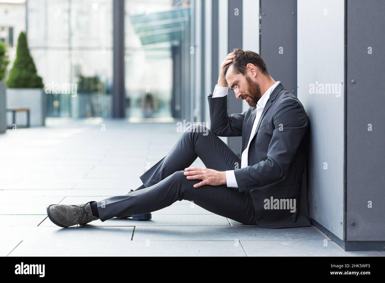 Office worker feeling despair sitting hi-res stock photography and ...