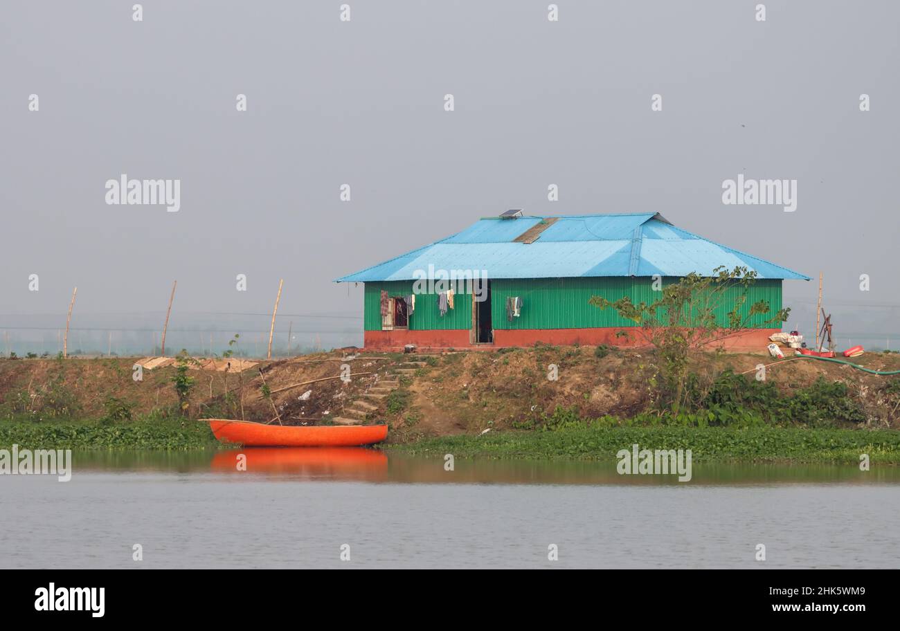 Colorful boat and house in Feni Muhuri Project,Chittagong, Bnagladesh ...