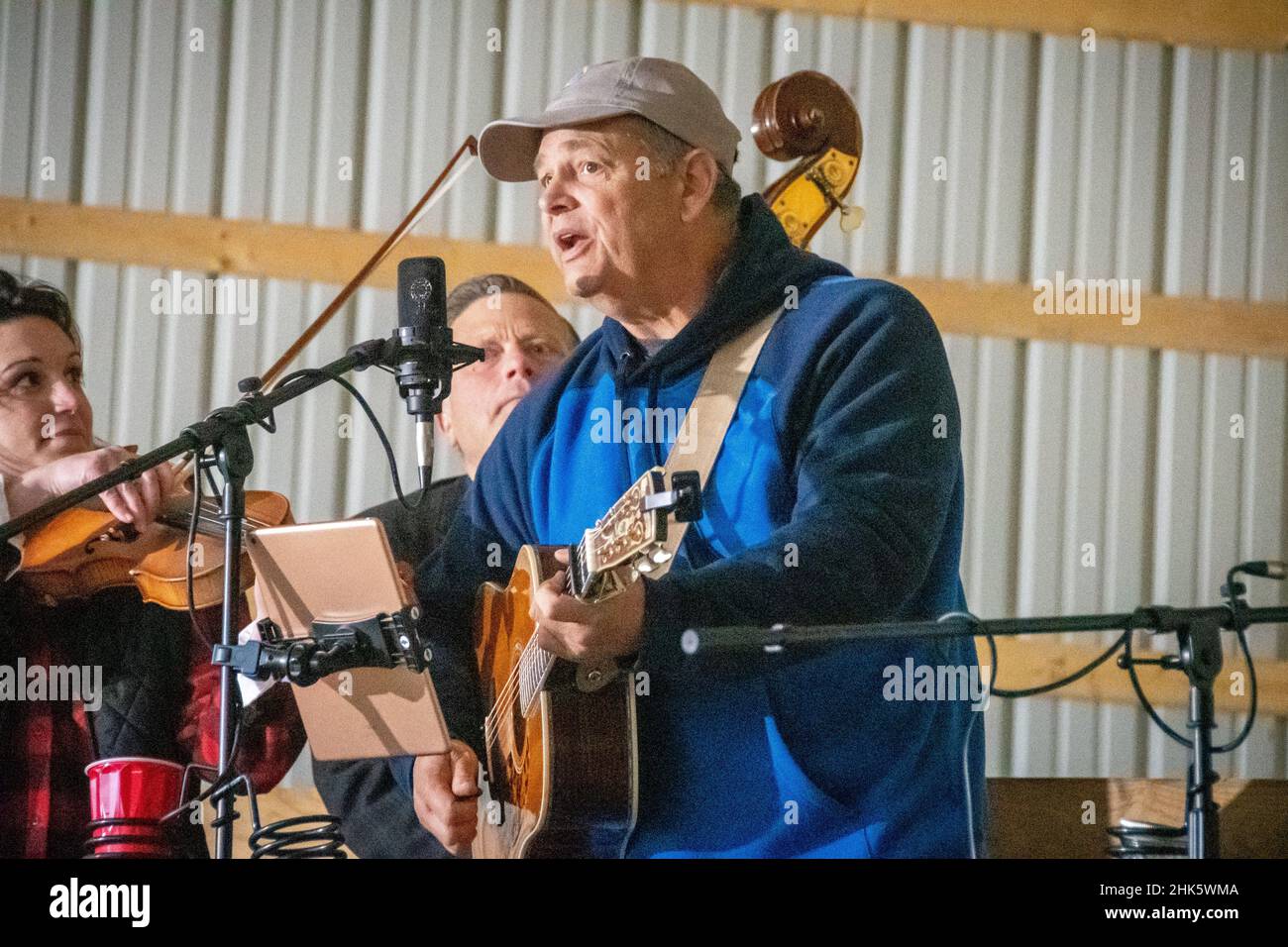 The Mayo Family band performing a barn concert from the back of a ...
