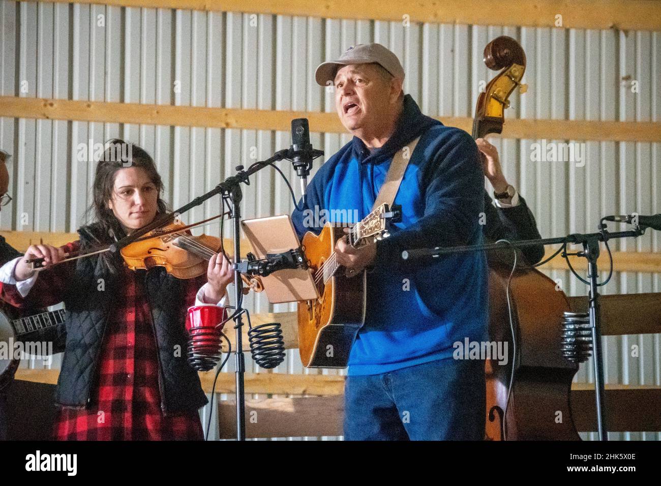 The Mayo Family band performing a barn concert from the back of a ...