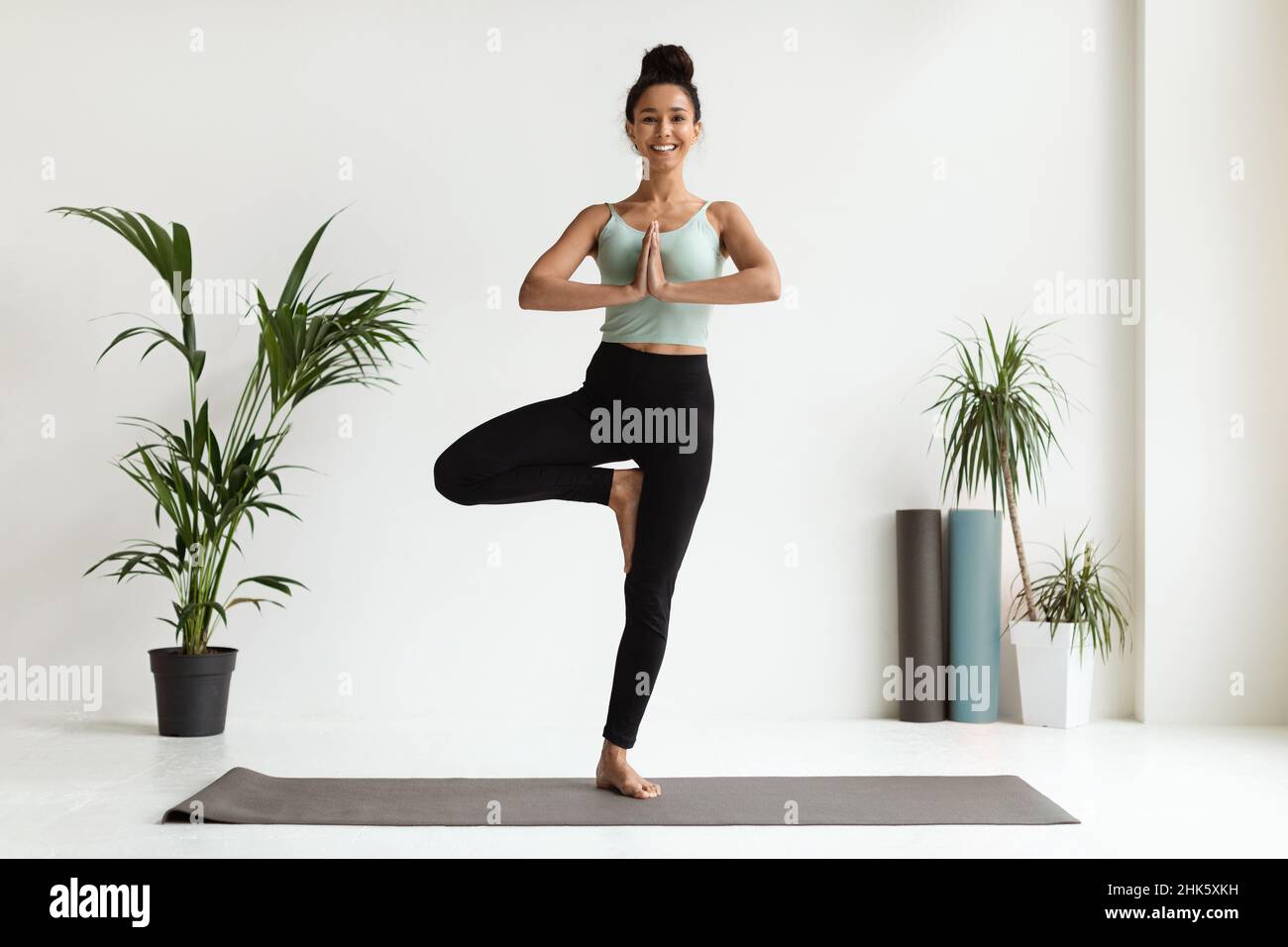 Yoga tree pose hi-res stock photography and images - Alamy
