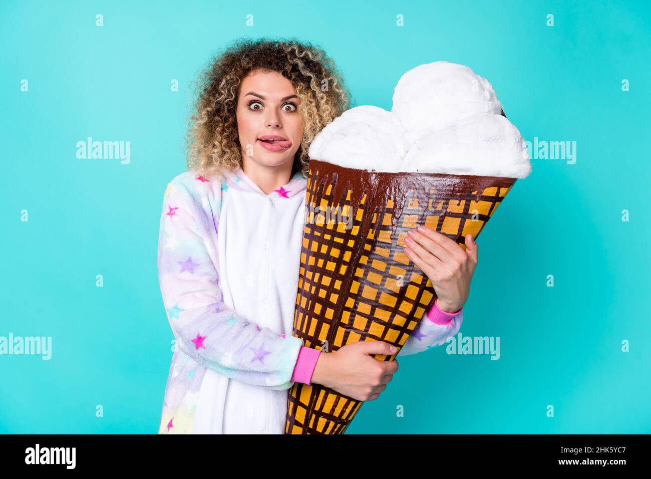 Portrait of attractive crazy cheery wavy-haired girl hugging fake ...