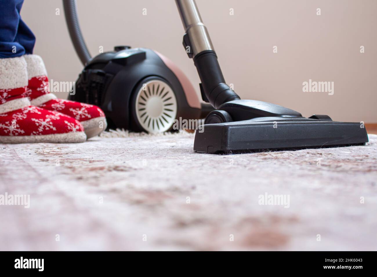 Woman using vacuum cleaner hi-res stock photography and images - Alamy