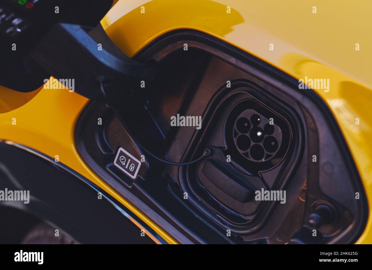 Close-in shot of electric cars power point plug Stock Photo - Alamy