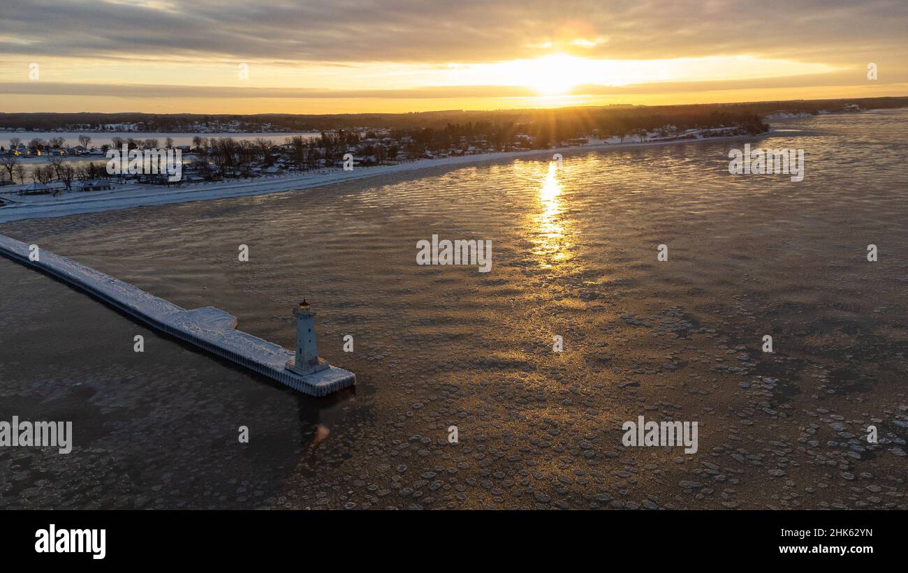 Beautiful Sunset Looking Over a Quiet Lighthouse Stock Photo - Alamy