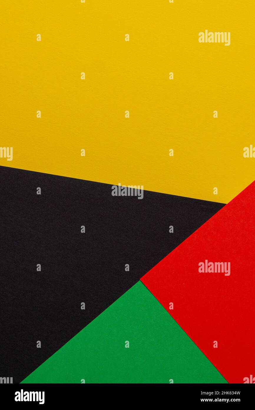 Abstract colored paper geometry composition background in black, red ...