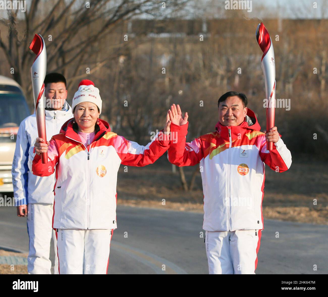Beijing, China. 2nd Feb, 2022. Torch bearers Li Shengli (R) and Li ...