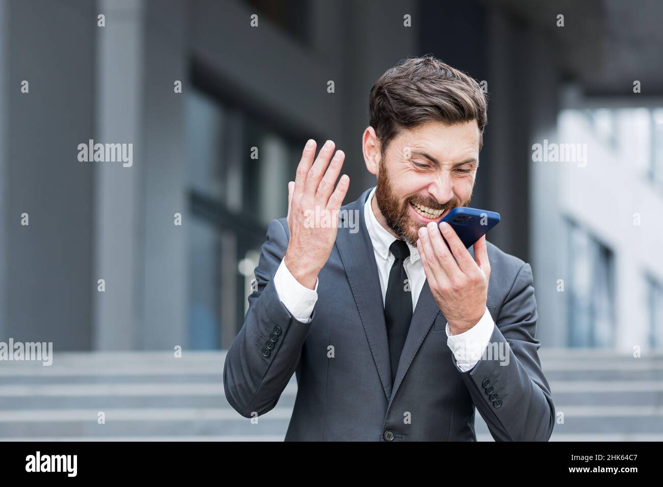 angry male businessman cry talking on the phone outside business man ...