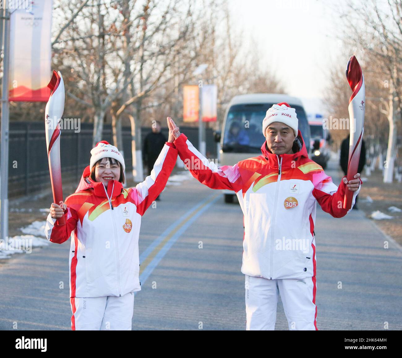 Beijing, China. 2nd Feb, 2022. Torch bearers Luo Qihua (L) and Liu ...