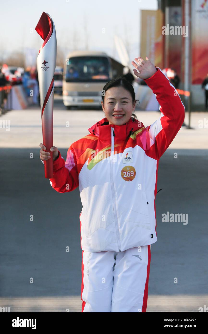 Beijing, China. 2nd Feb, 2022. Torch bearer Fan Yiting runs with the torch during the Beijing ...
