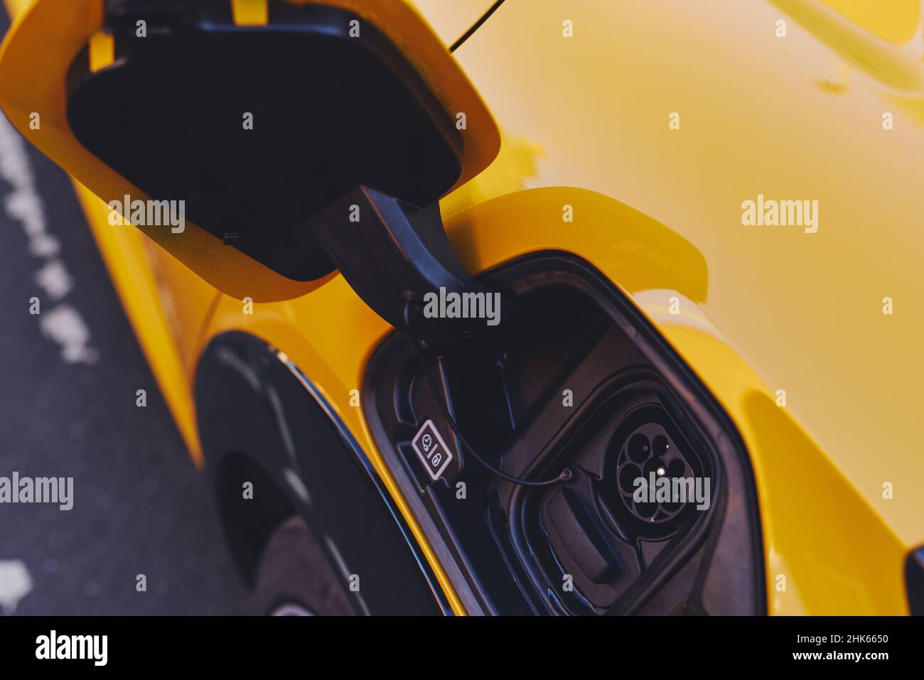 Close-in shot of electric cars power point plug Stock Photo - Alamy