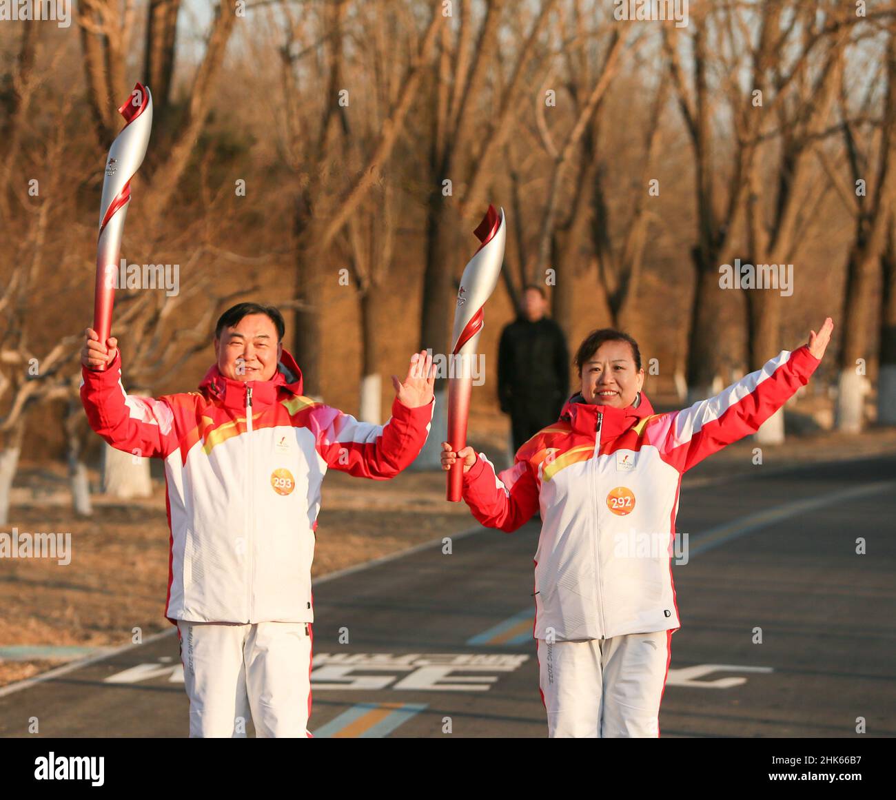Beijing, China. 2nd Feb, 2022. Torch bearers Li Shengli (L) and Li Ping ...