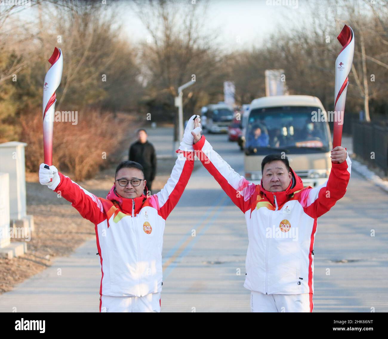 Beijing, China. 2nd Feb, 2022. Torch bearers Liu Haiming (R) and Liu Jianfeng attend the Beijing ...