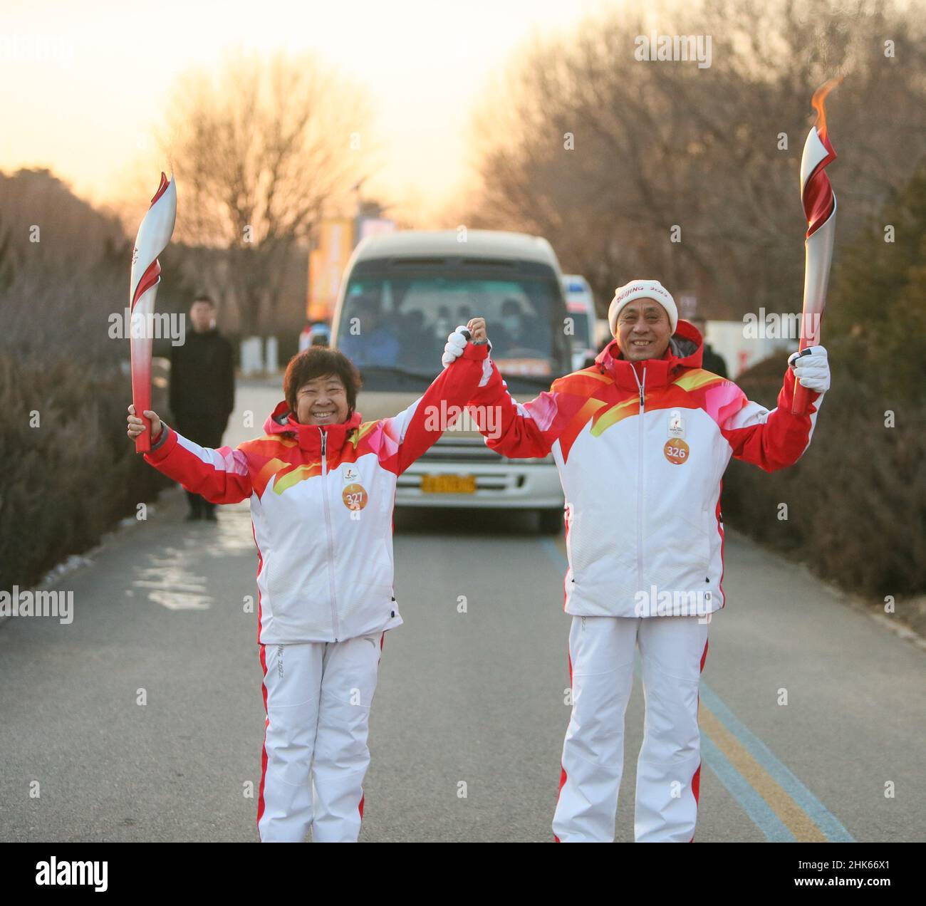 Beijing, China. 2nd Feb, 2022. Torch bearers Wang Quan (R) and Wang ...