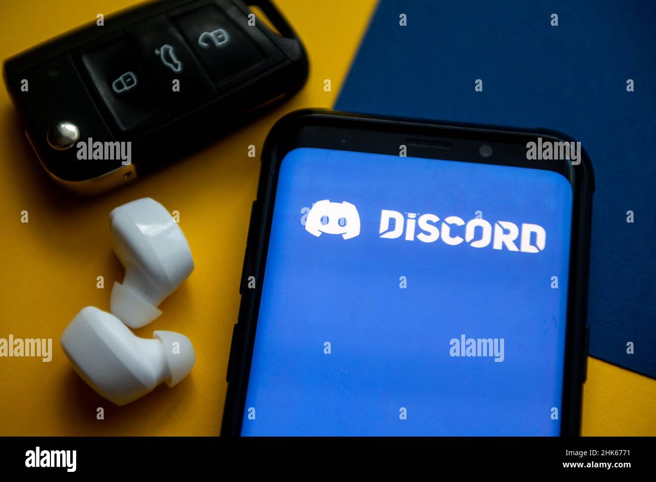 In this photo illustration a Discord logo seen displayed on a ...