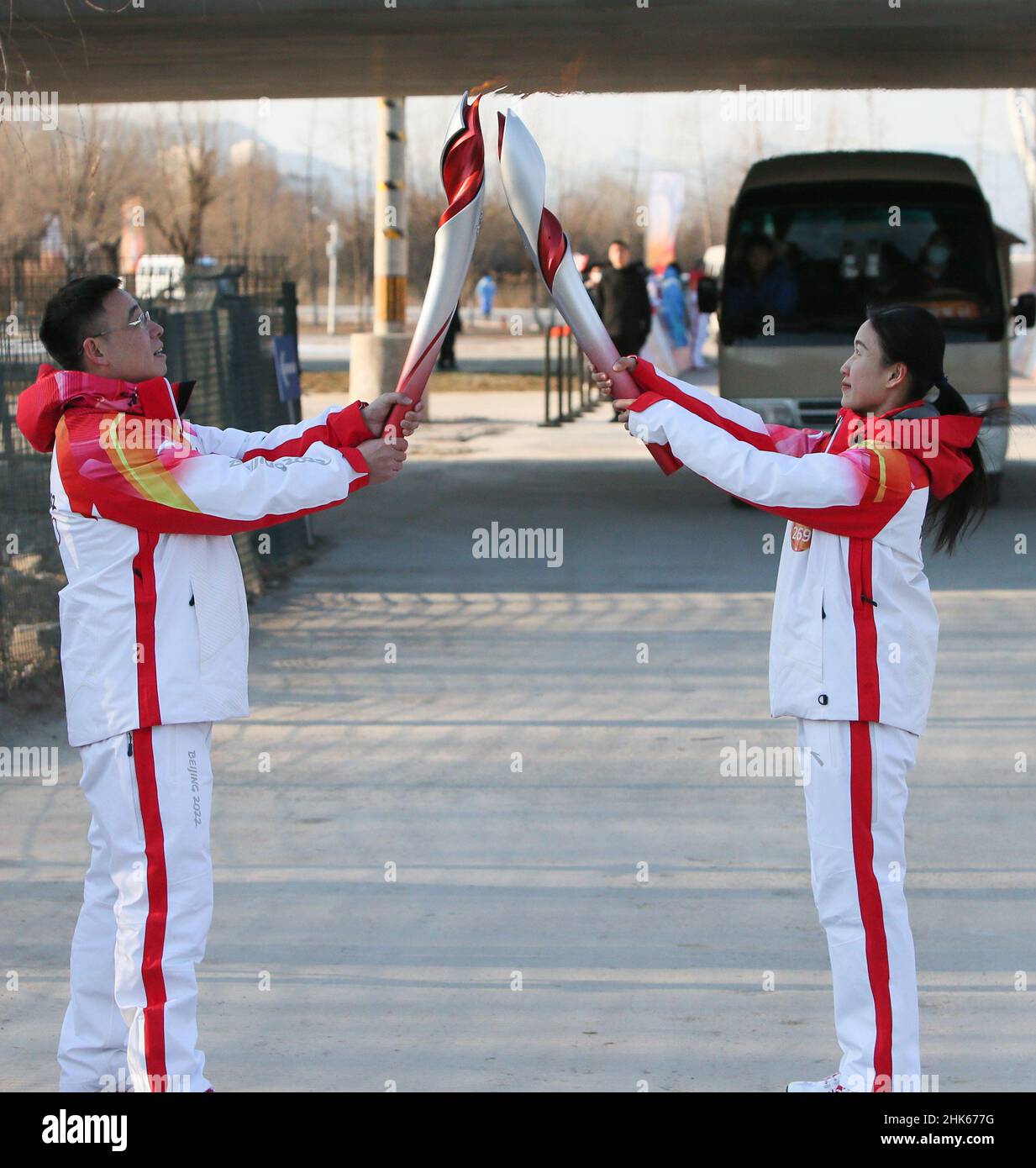 Beijing, China. 2nd Feb, 2022. Torch bearers Fan Yiting (R) and Fu ...