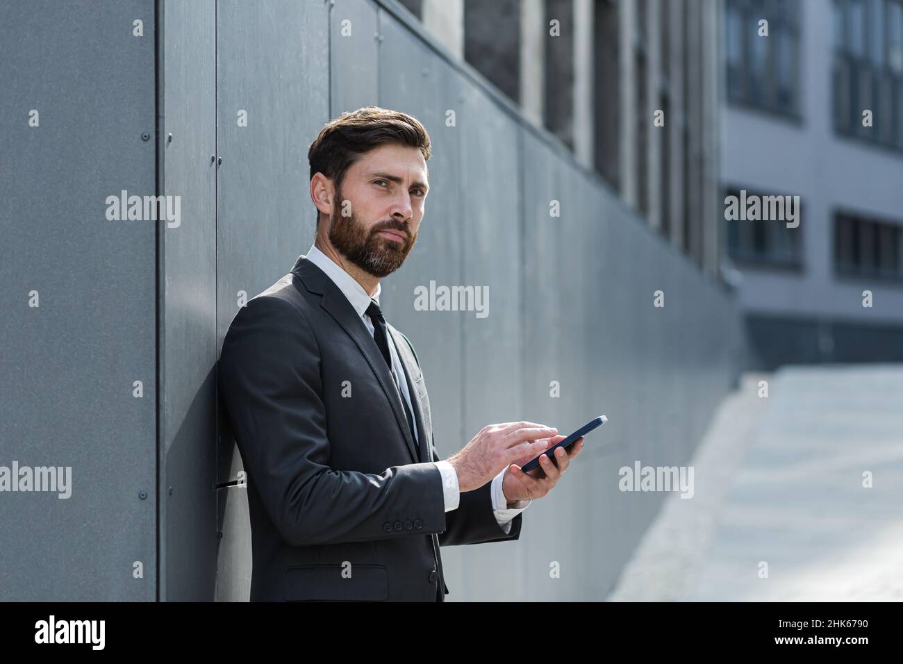 Businessman typing text messages on hi-res stock photography and images ...