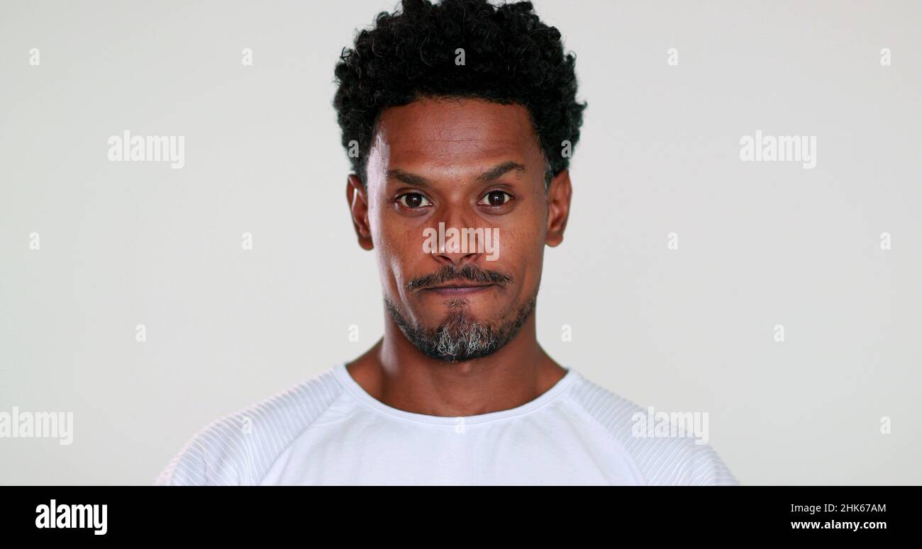 African man feeling surprised, expressive portrait showing angst ...