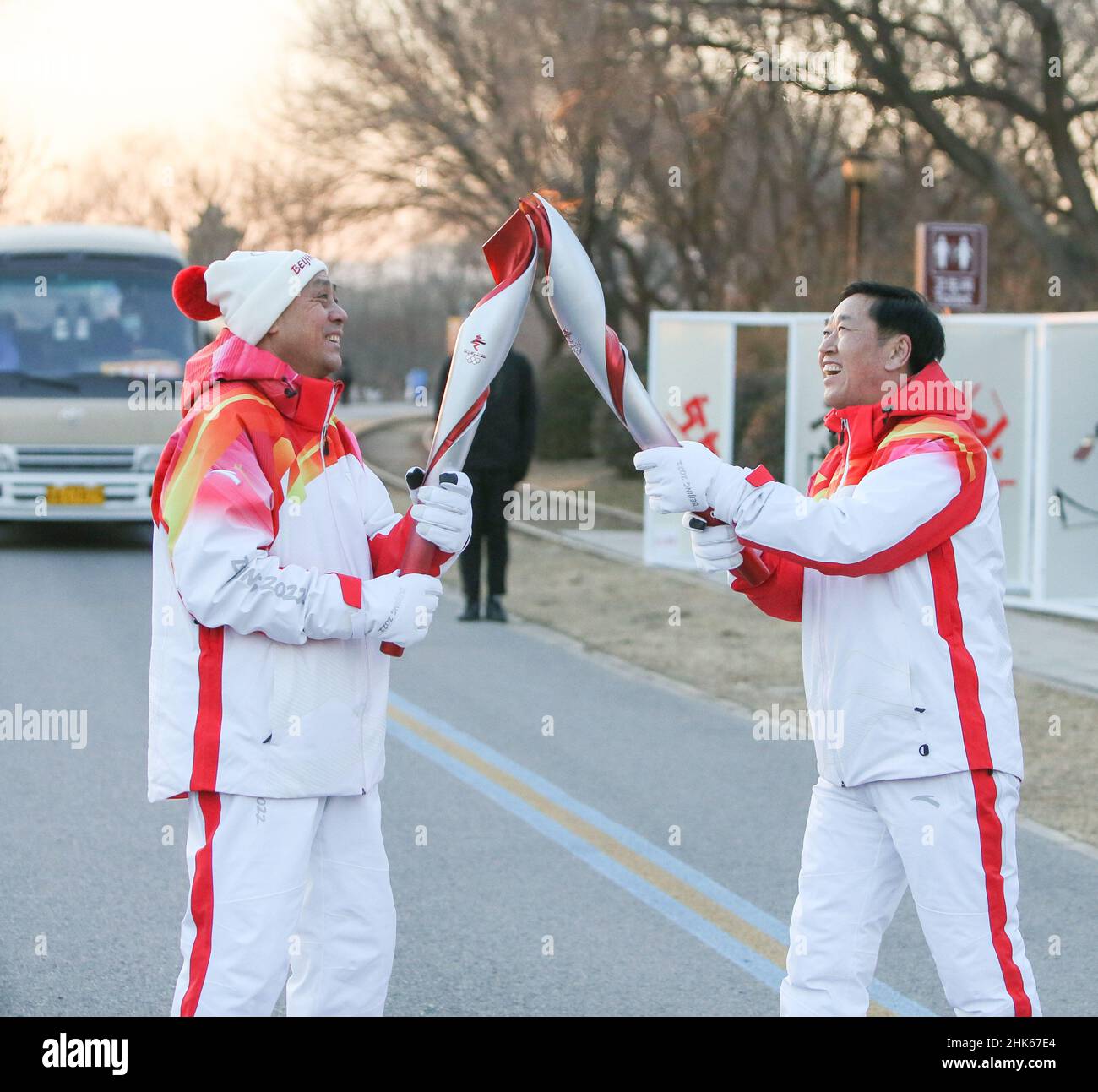 Beijing, China. 2nd Feb, 2022. Torch bearers Wang Juncheng (R) and Wang Quan attend the Beijing ...