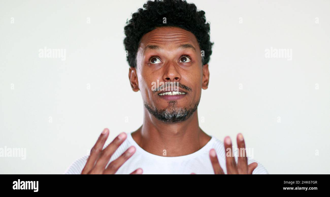 African man speaking to camera giving testimony Stock Photo - Alamy