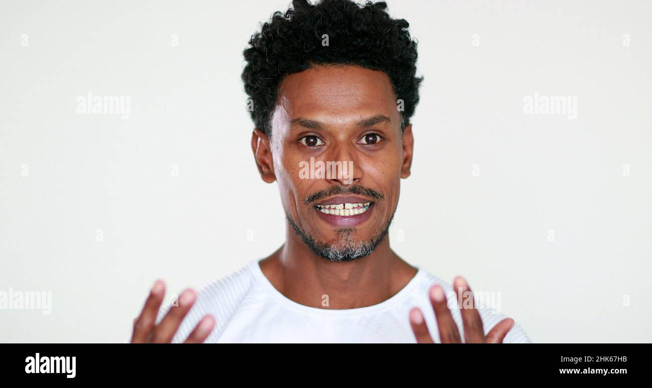 African man speaking to camera giving testimony Stock Photo - Alamy