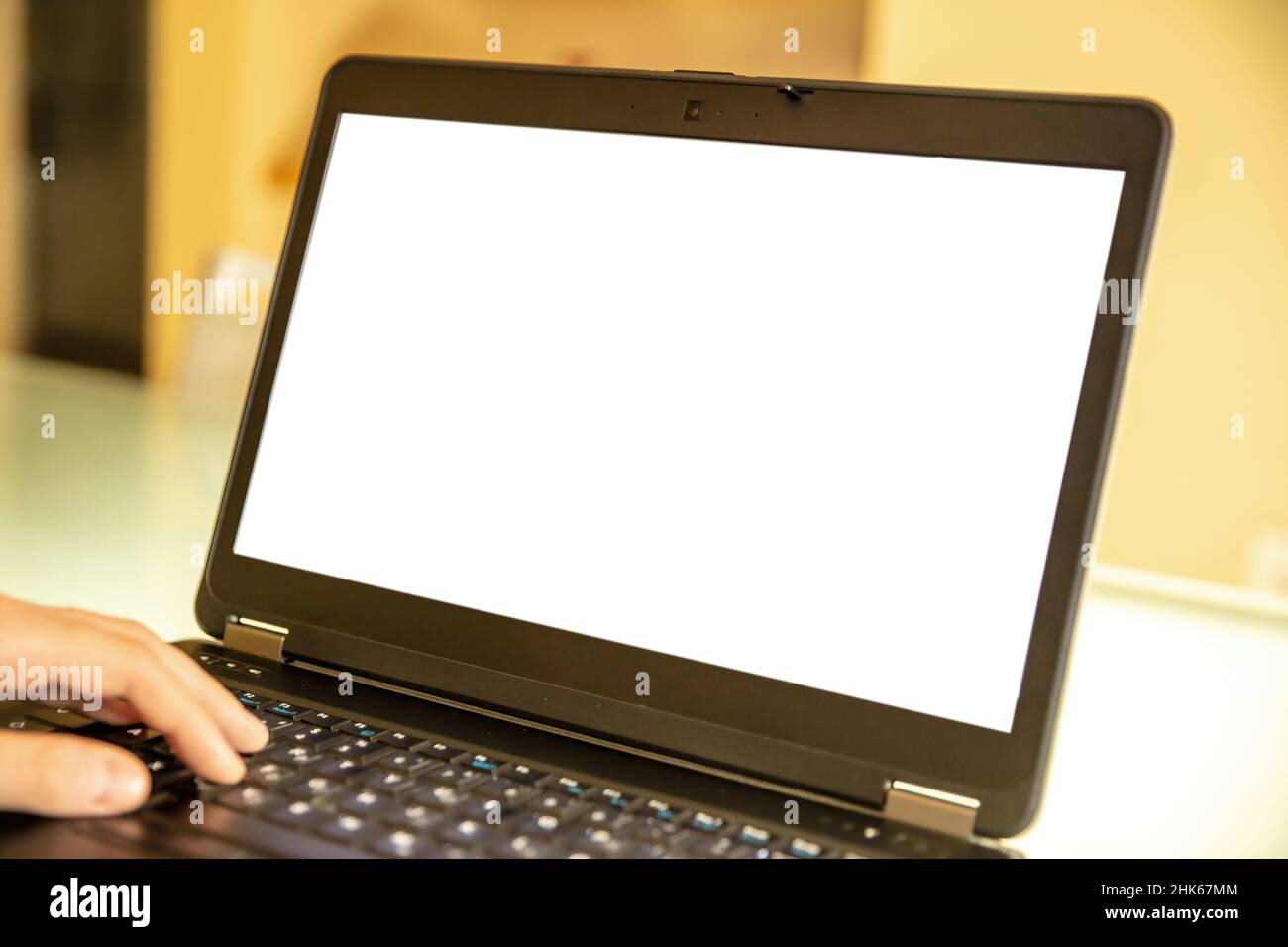 Blank screen laptop computer, home office work. Man type, open notebook ...