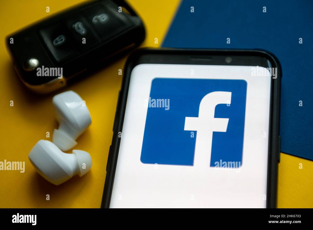 In this photo illustration a Facebook logo seen displayed on a ...