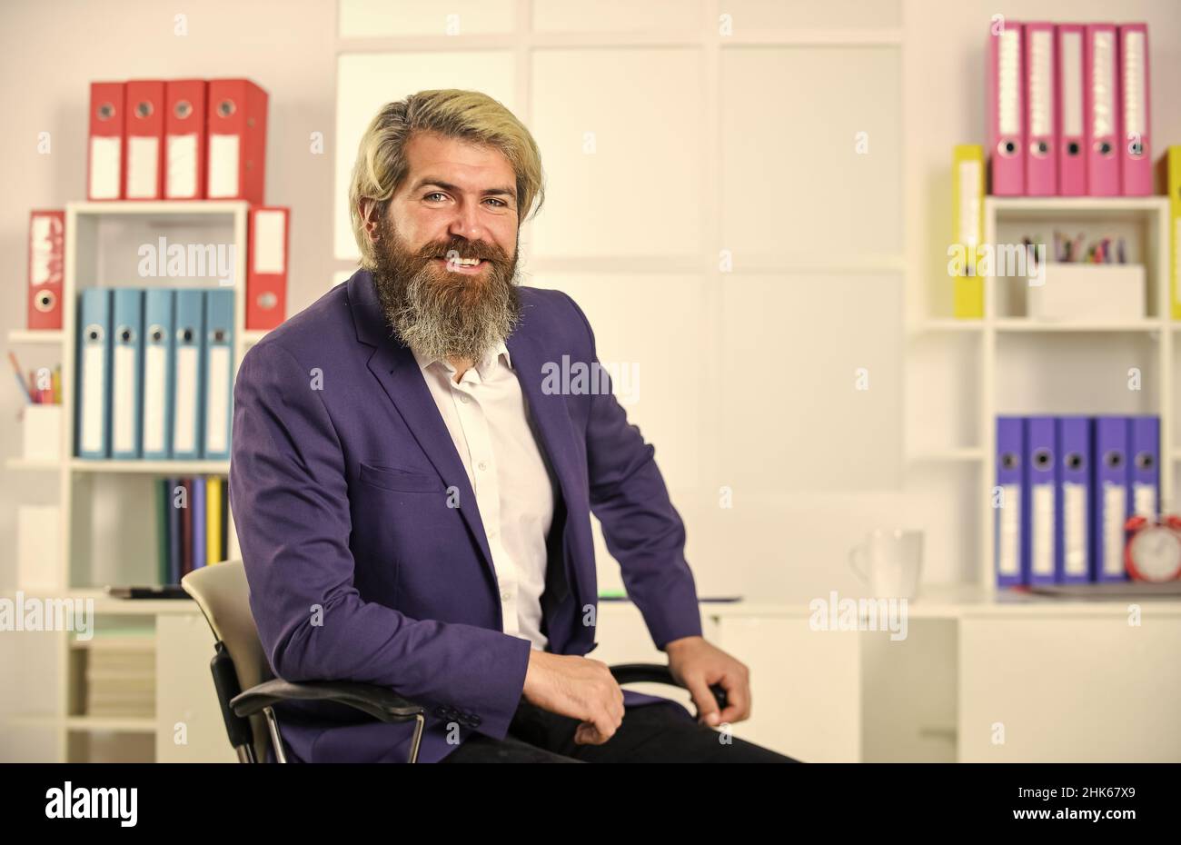 Management skills. Entrepreneur in modern office. Successful bearded ...