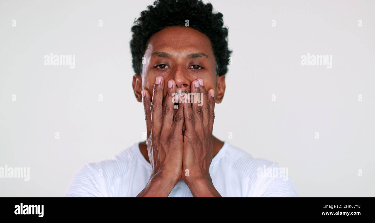 Anxious African man feeling nervous and anxiety portrait face emotion ...