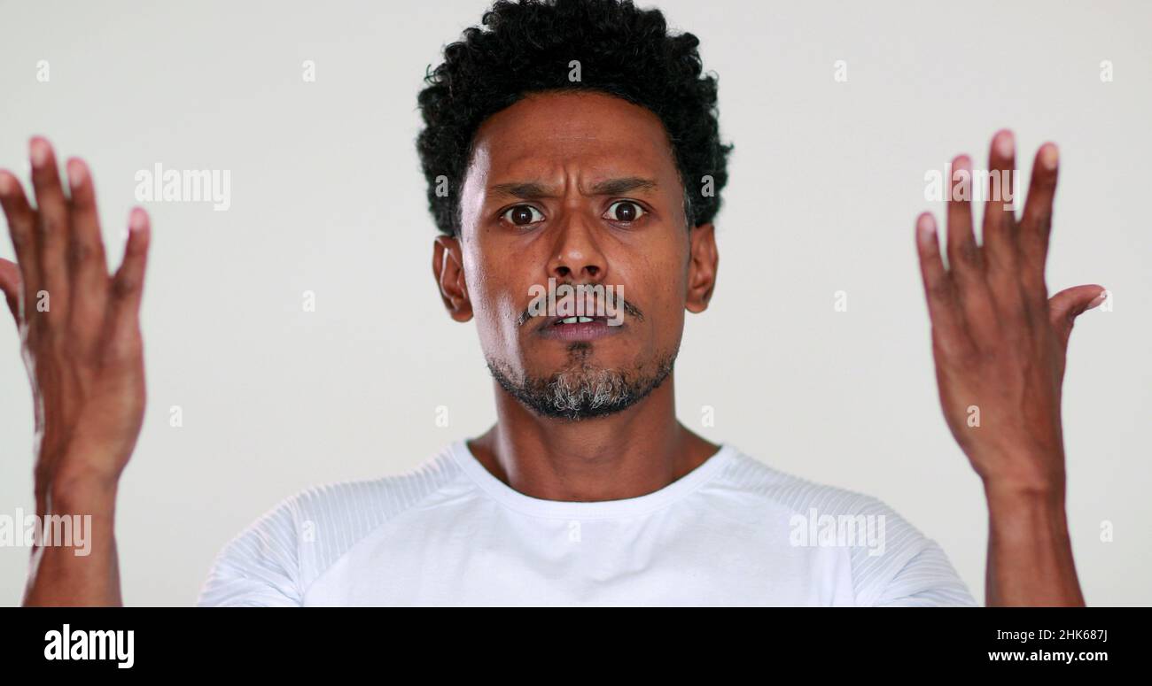 Black man in disbelief shock reaction emotion portrait face Stock Photo - Alamy