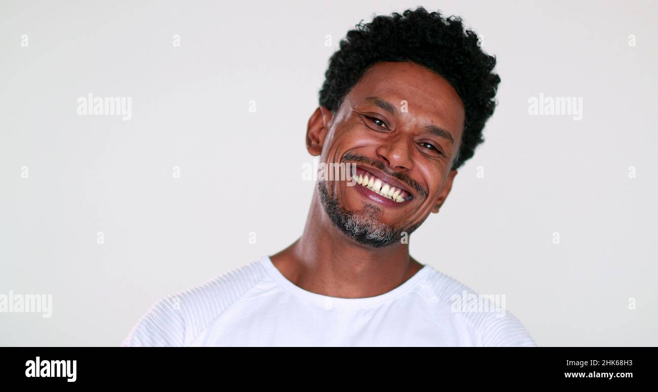 Happy black African man smiling and laughing portrait, charismatic man ...