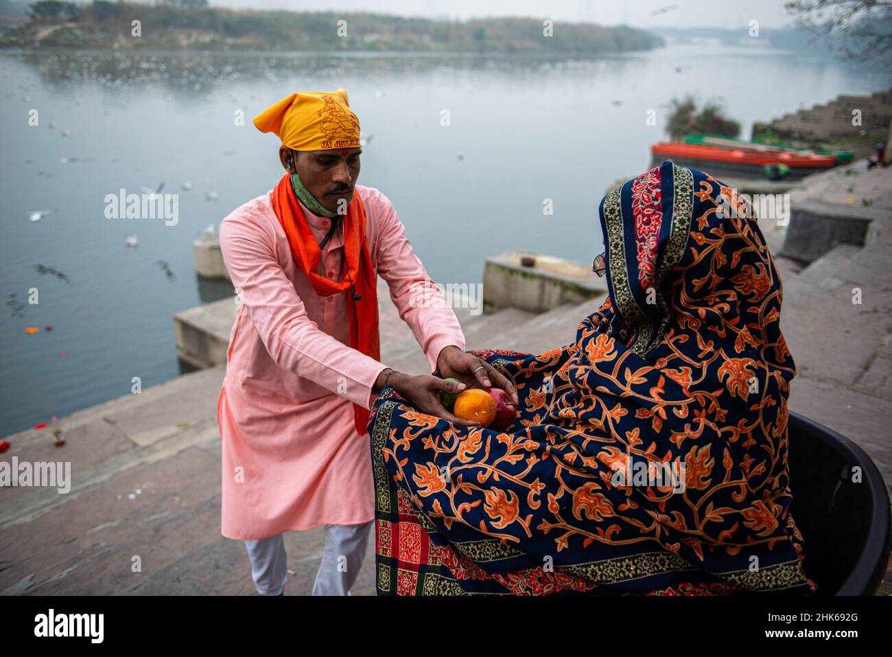 A sindhi man seen donating fruits to a local woman after performing ...