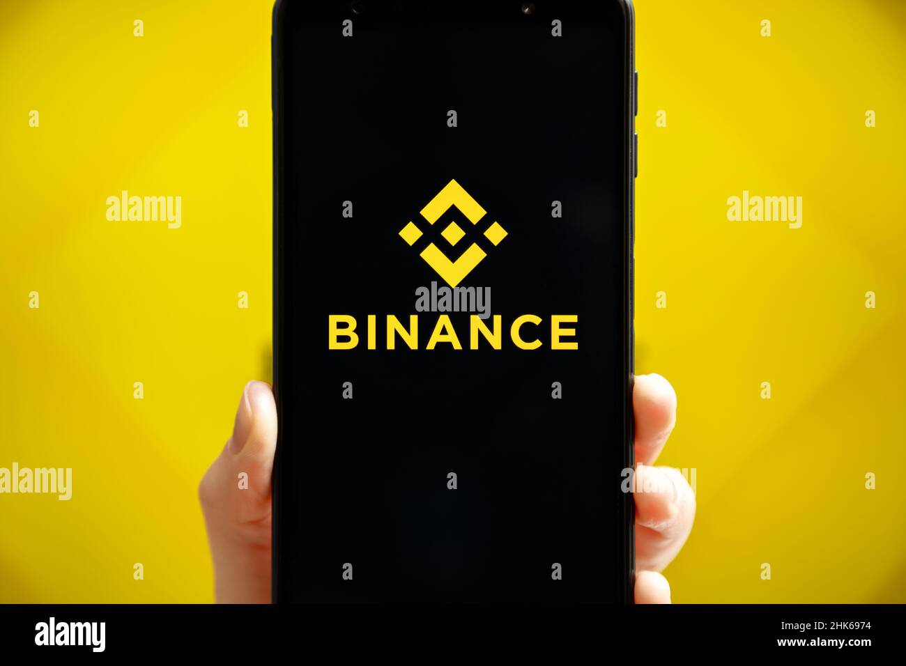 Ukraine, Odessa - October, 9 2021: Hand holding mobile with Binance app ...