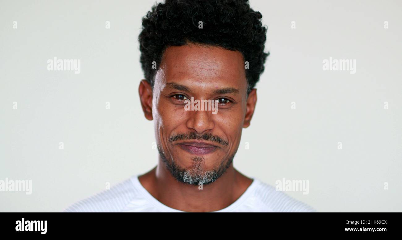 Portrait handsome person smiling to camera, African american real life ...