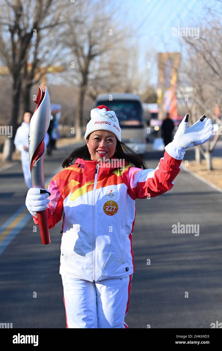 Beijing, China. 2nd Feb, 2022. Torch bearer Melissa Yin-Yin Lam runs ...