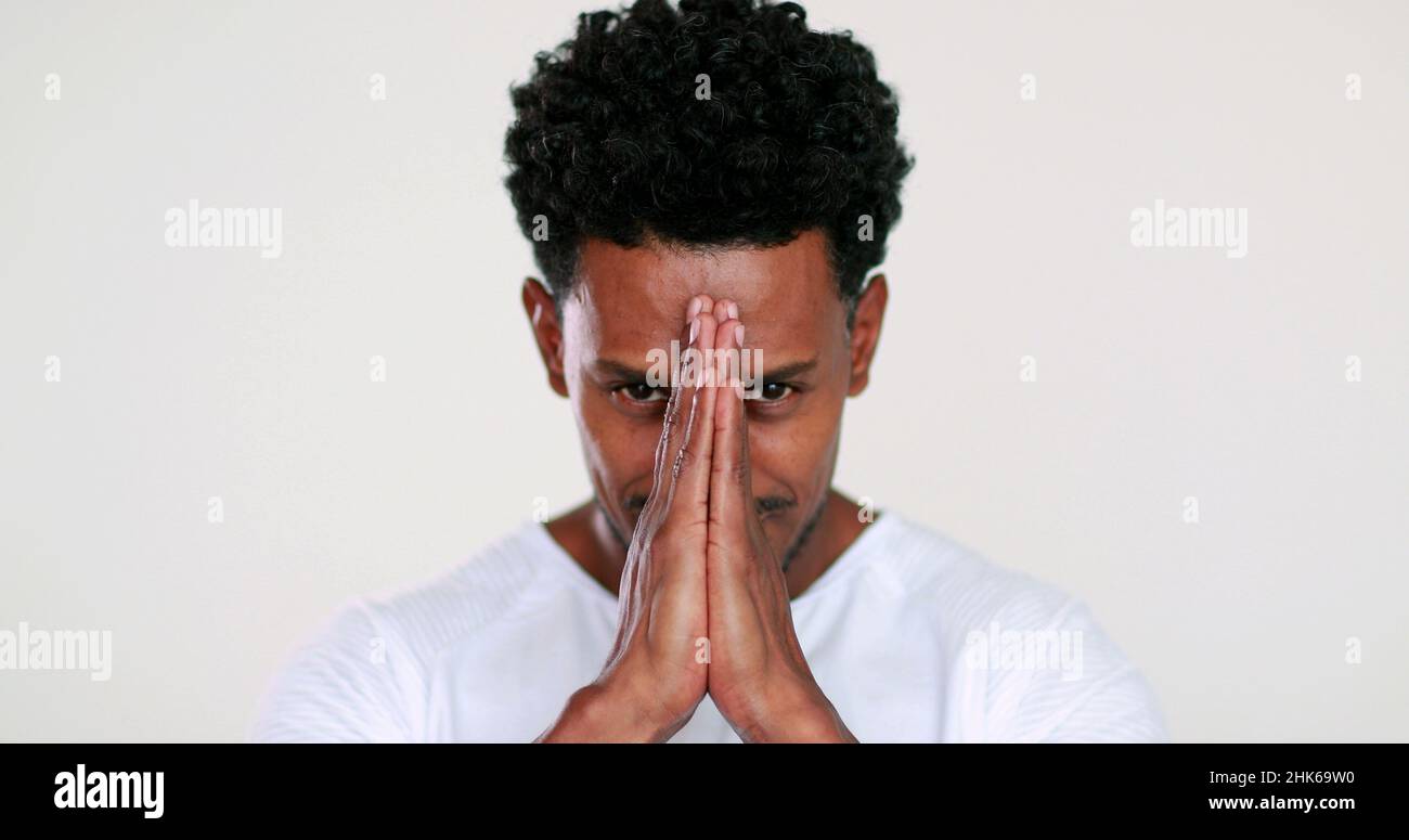 Smiling african person worshiping and praying having faith Stock Photo ...