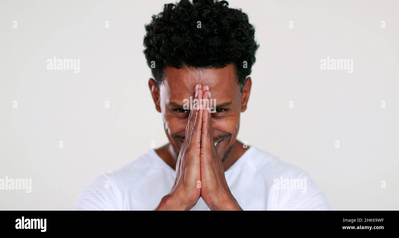 Smiling african person worshiping and praying having faith Stock Photo ...