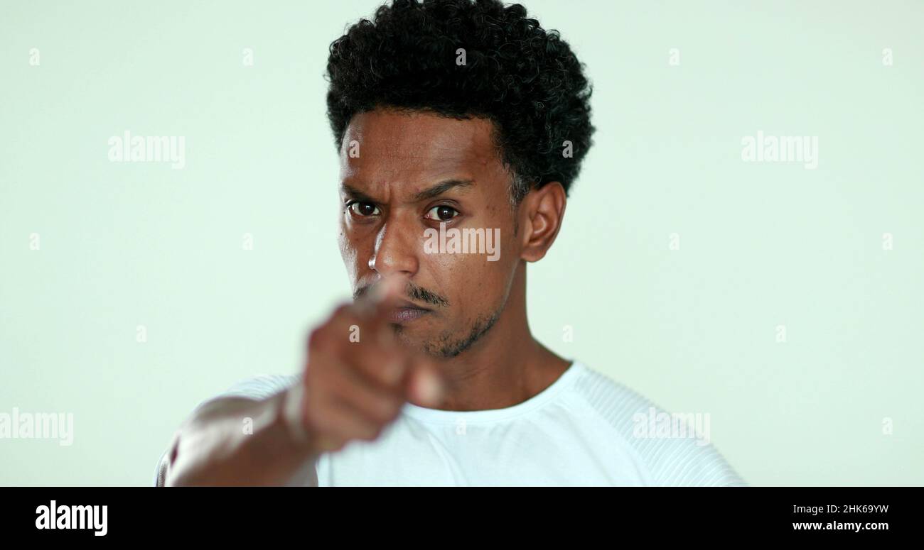 Upset African man pointing finger arguing. Black man in argument ...