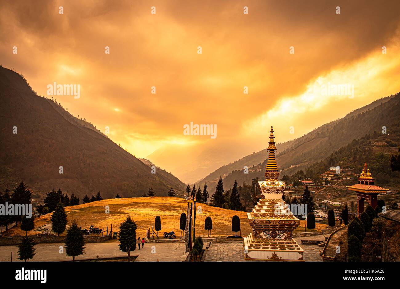 Buddhist stupa with himalayan mountain background and dramatic sky at ...