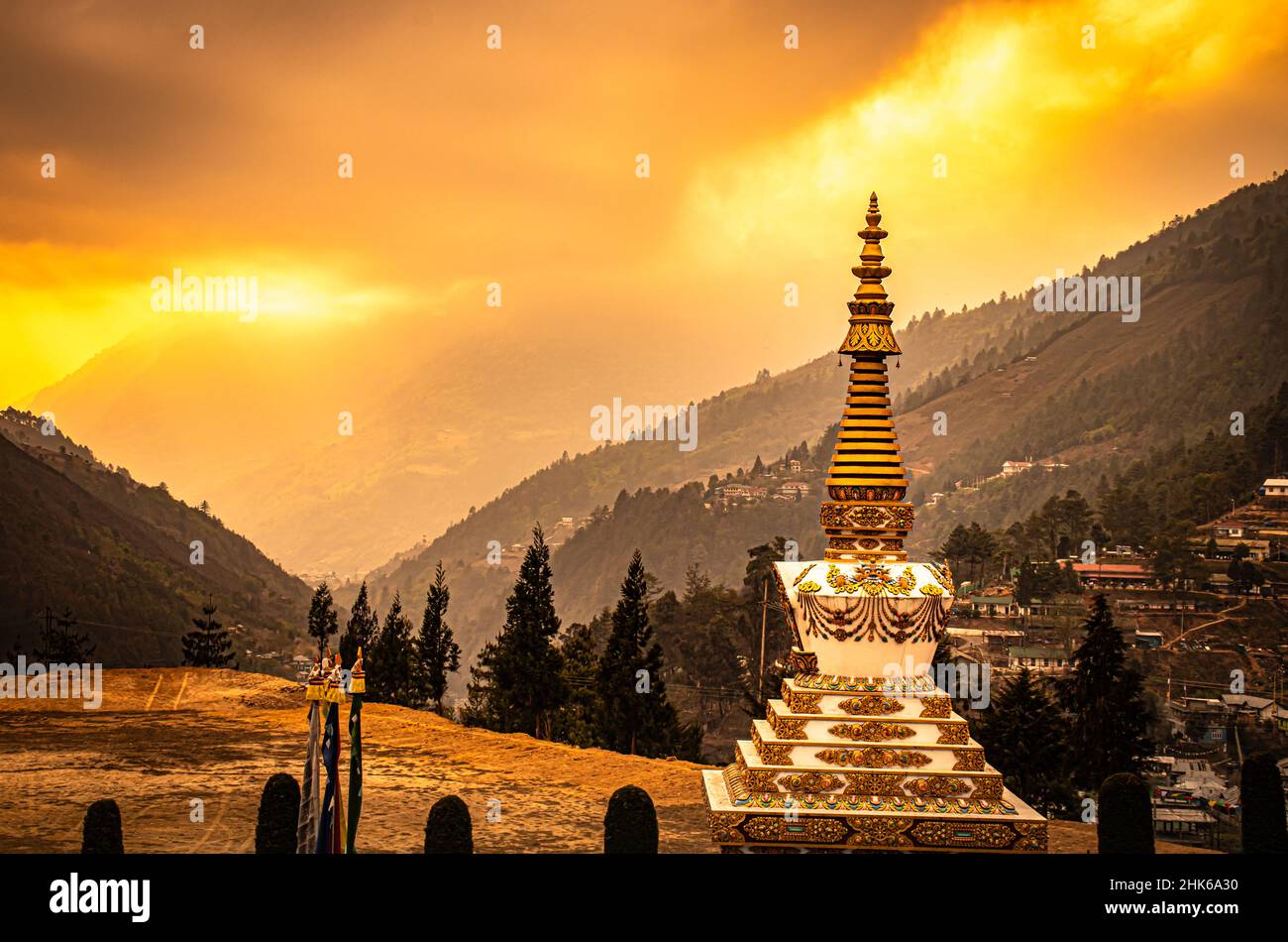 Buddhist stupa with himalayan mountain background and dramatic sky at ...