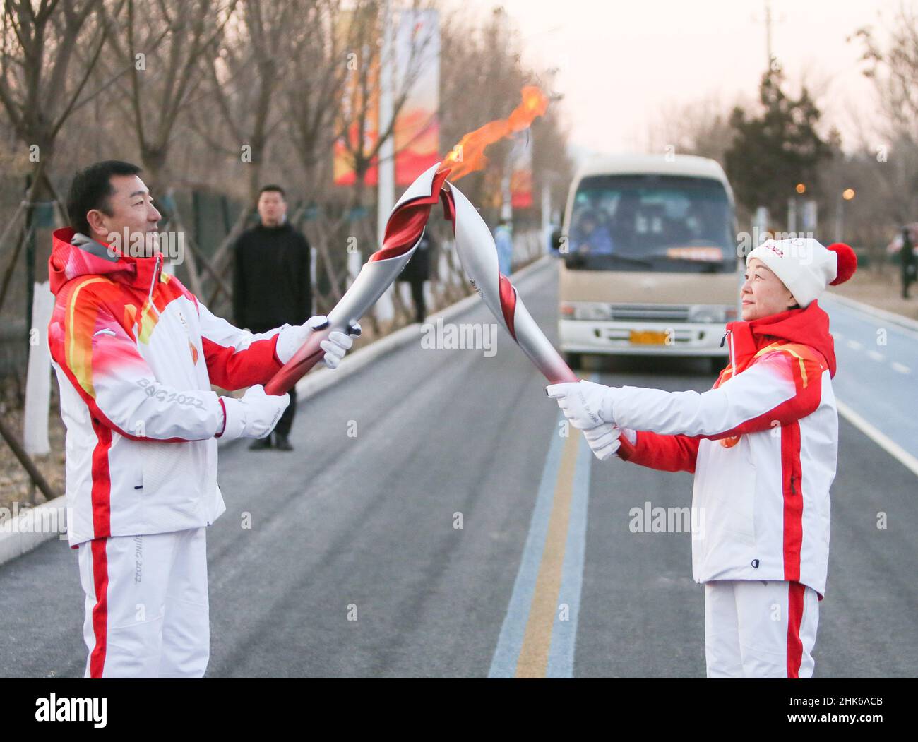 Beijing, China. 2nd Feb, 2022. Torch bearers Yang Ling (L) and Yang Dan attend the Beijing 2022 ...
