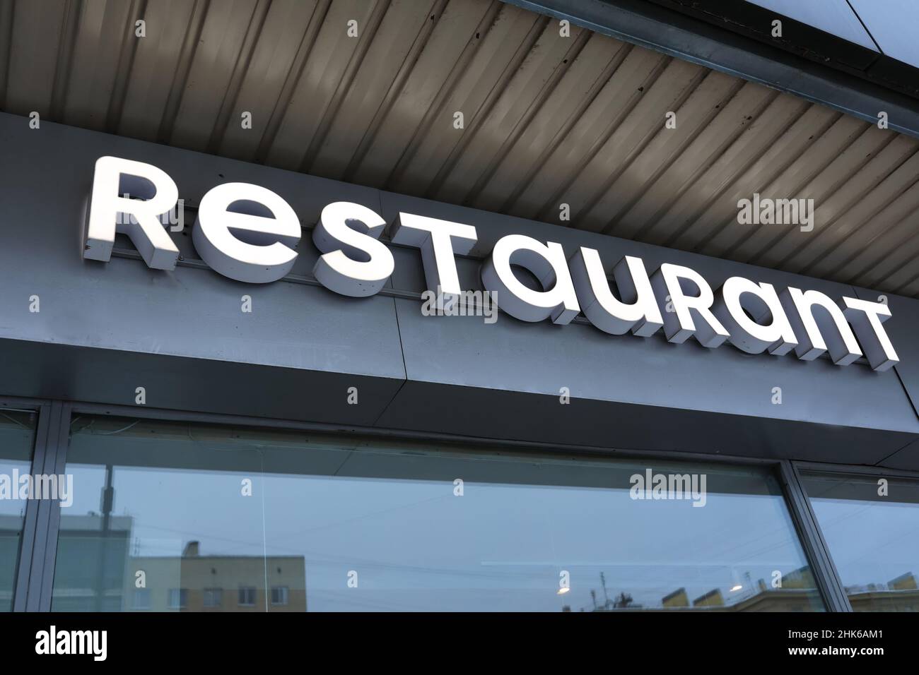 View of restaurant sign board on wall of building Stock Photo - Alamy