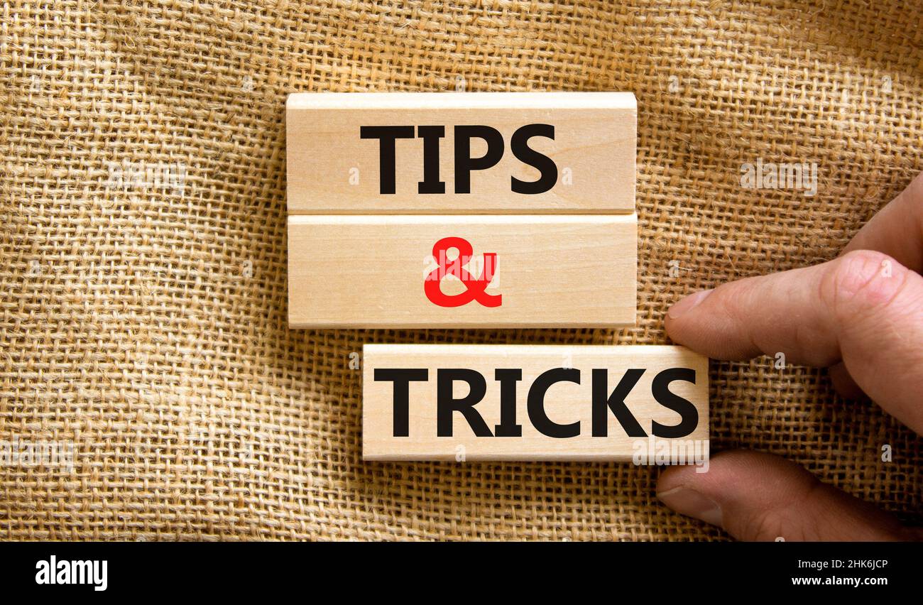 Tips and tricks symbol. Concept words Tips and tricks on wooden blocks ...