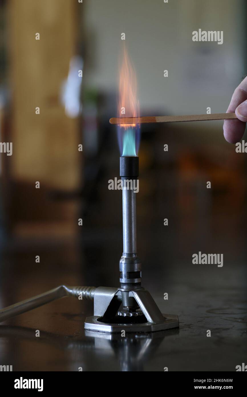 Cobalt solution burning on a wooden splint Stock Photo - Alamy