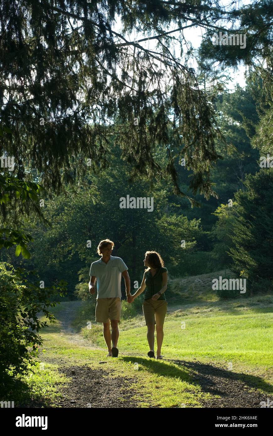 Couple Walking Down A Path