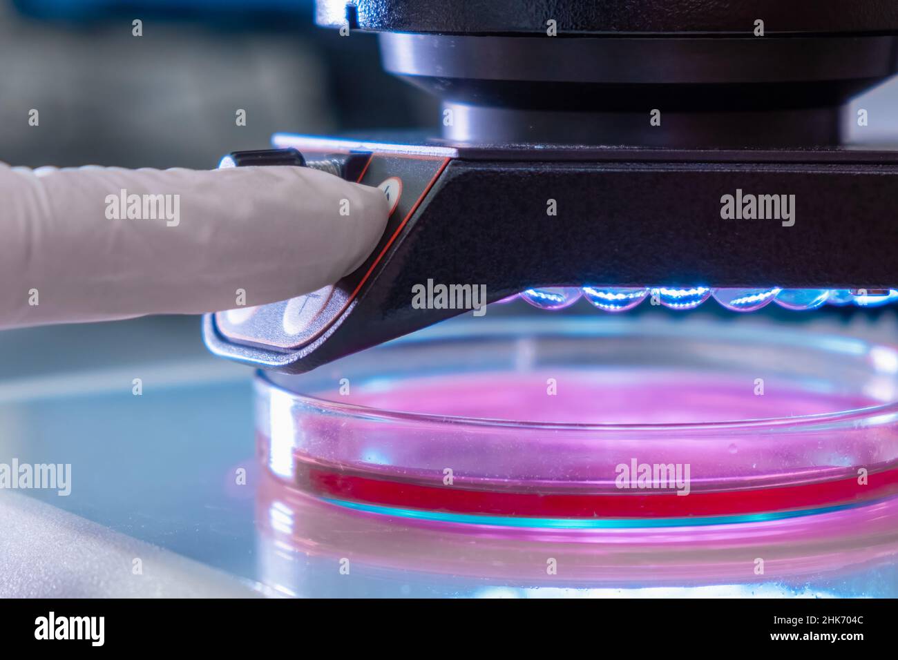 Microscope in a medical research center for analyzing sample. Scientist ...