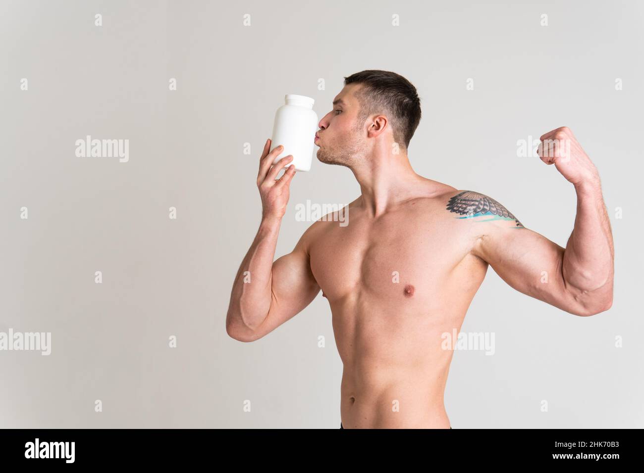 Fitness protein jars white on white background bodybuilder powder ...