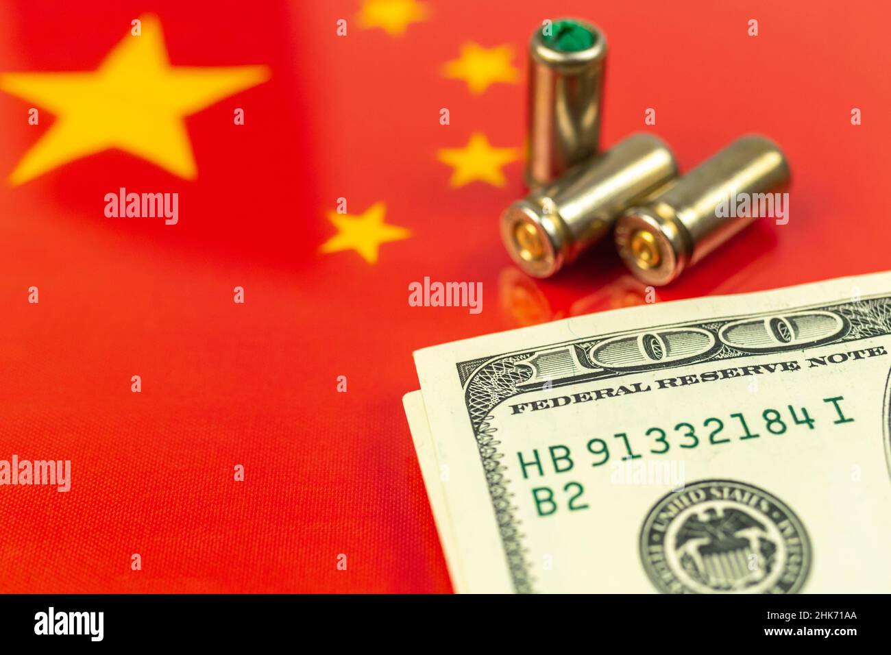Gun bullets and dollar money over the China flag. Criminal and ...